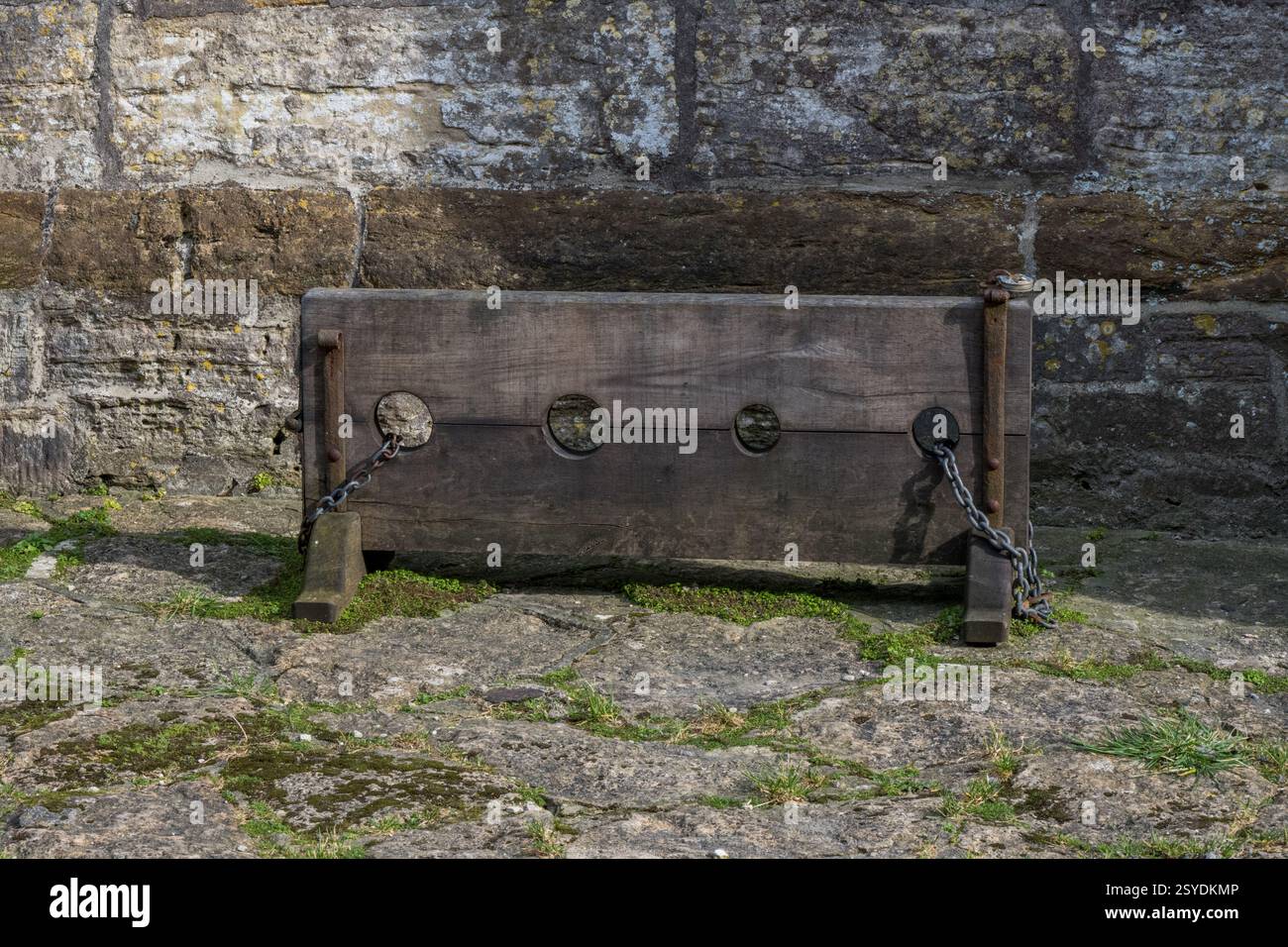 Medieval stocks at St Mary's Church. Cerne Abbas. Dorset' Stock Photo ...