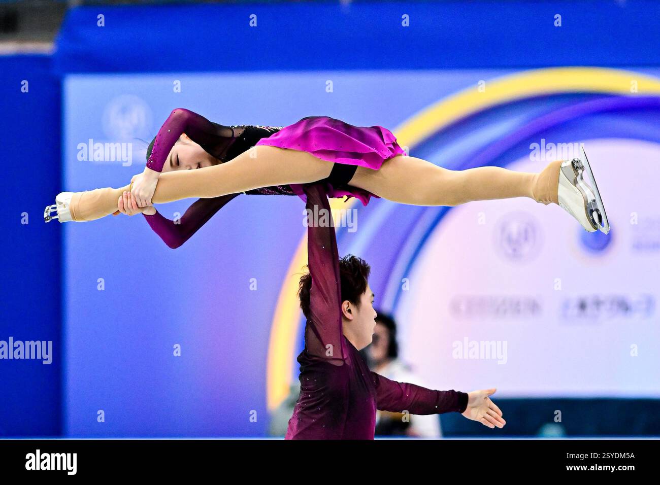 Jiaxuan ZHANG & Yihang HUANG (CHN), during Junior Pairs Short Program ...