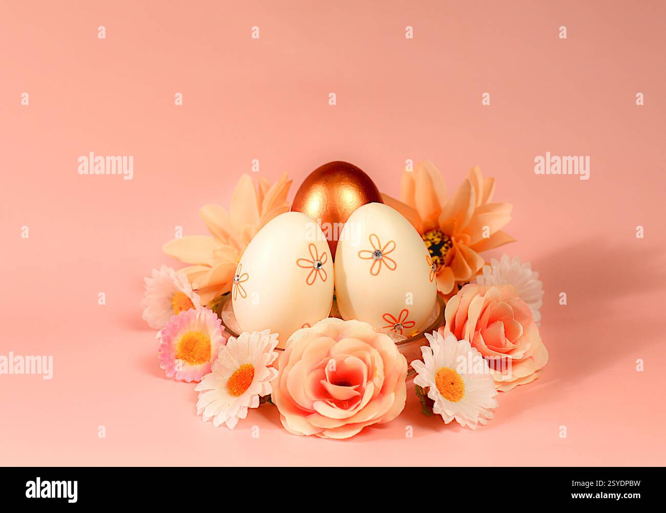 Abstract easter composition with painted eggs and spring flowers ...