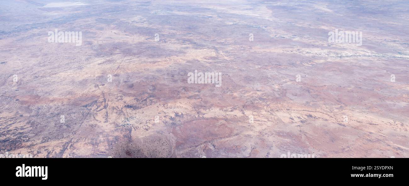 aerial landscape with barren ground in Kalahari desert, shot from a ...