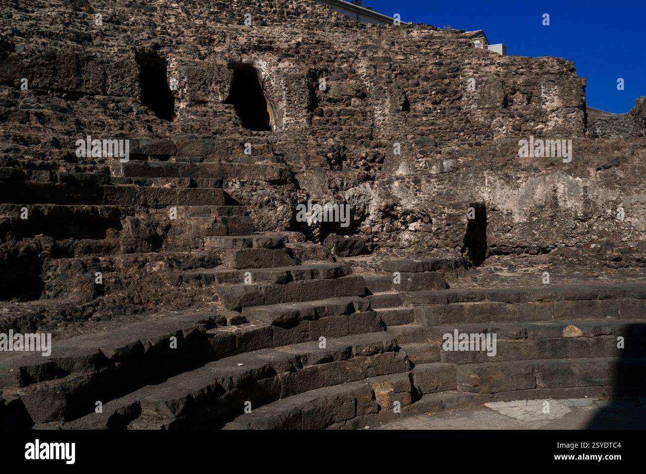 Rubble walls and blocks of basalt lava stone from Mount Etna eruptions ...