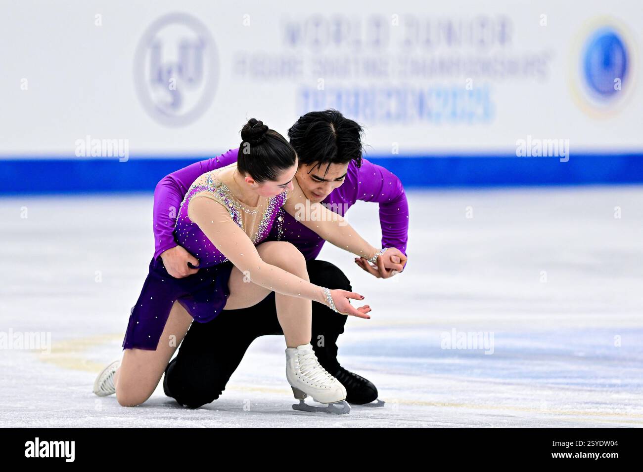 Olivia FLORES & Luke WANG (USA), during Junior Pairs Short Program, at the ISU World Junior ...