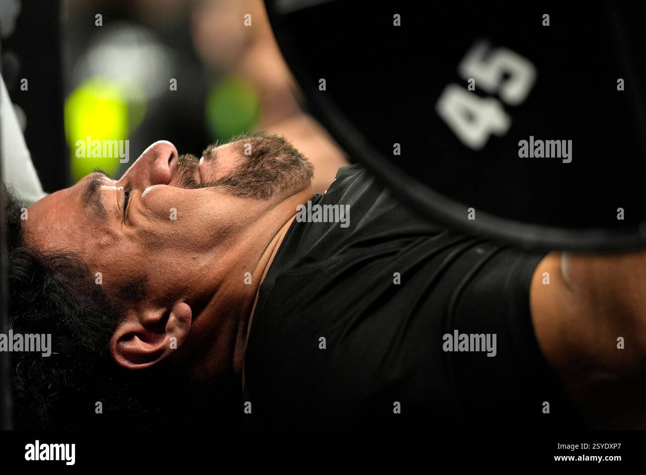 Utah defensive lineman Junior Tafuna lifts weights at the NFL football ...