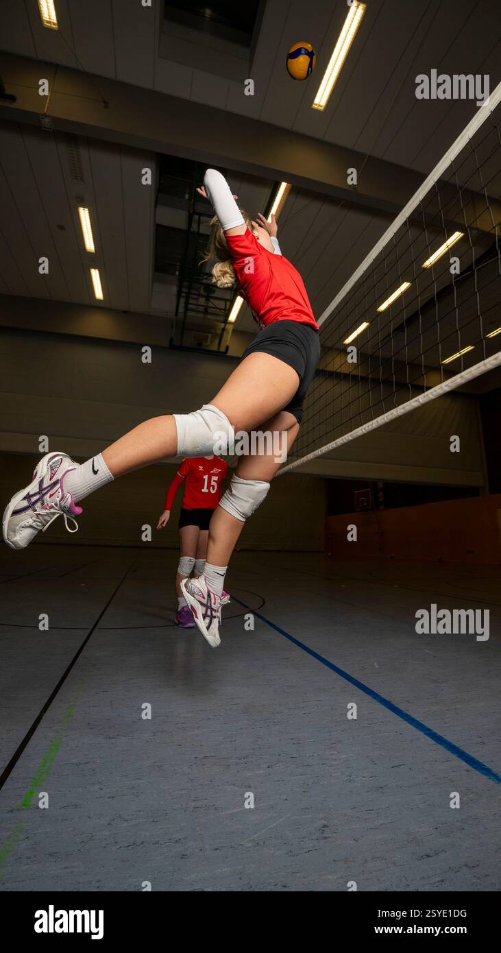 Aerial volleyball practice indoors with off camera flash Stock Photo ...