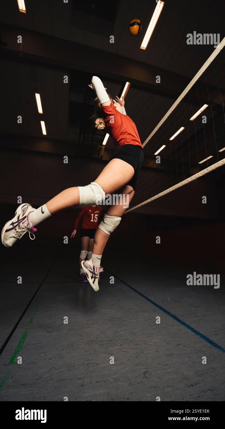Aerial volleyball practice indoors with off camera flash Stock Photo ...
