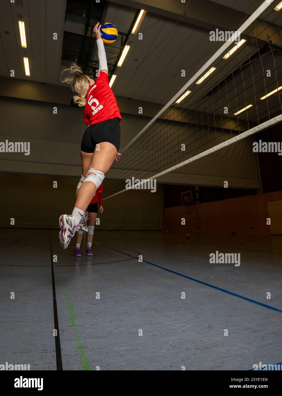 Aerial volleyball practice indoors with off camera flash Stock Photo ...