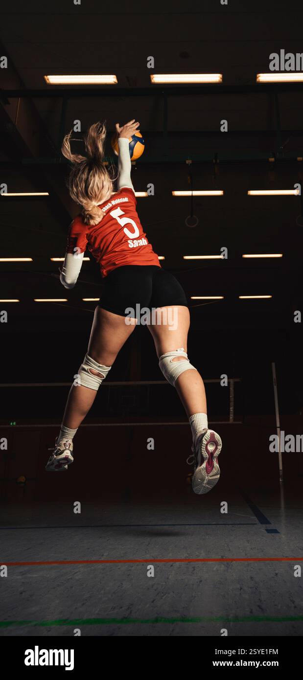Aerial volleyball practice indoors with off camera flash Stock Photo ...
