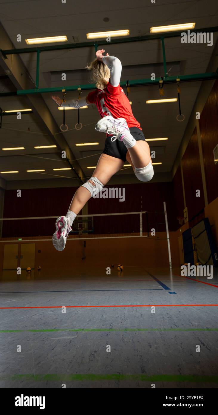 Aerial volleyball practice indoors with off camera flash Stock Photo ...