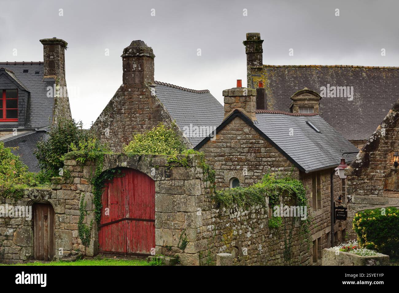 324 Black slate gable roofs and rear courtyard walls of granite ashlar ...