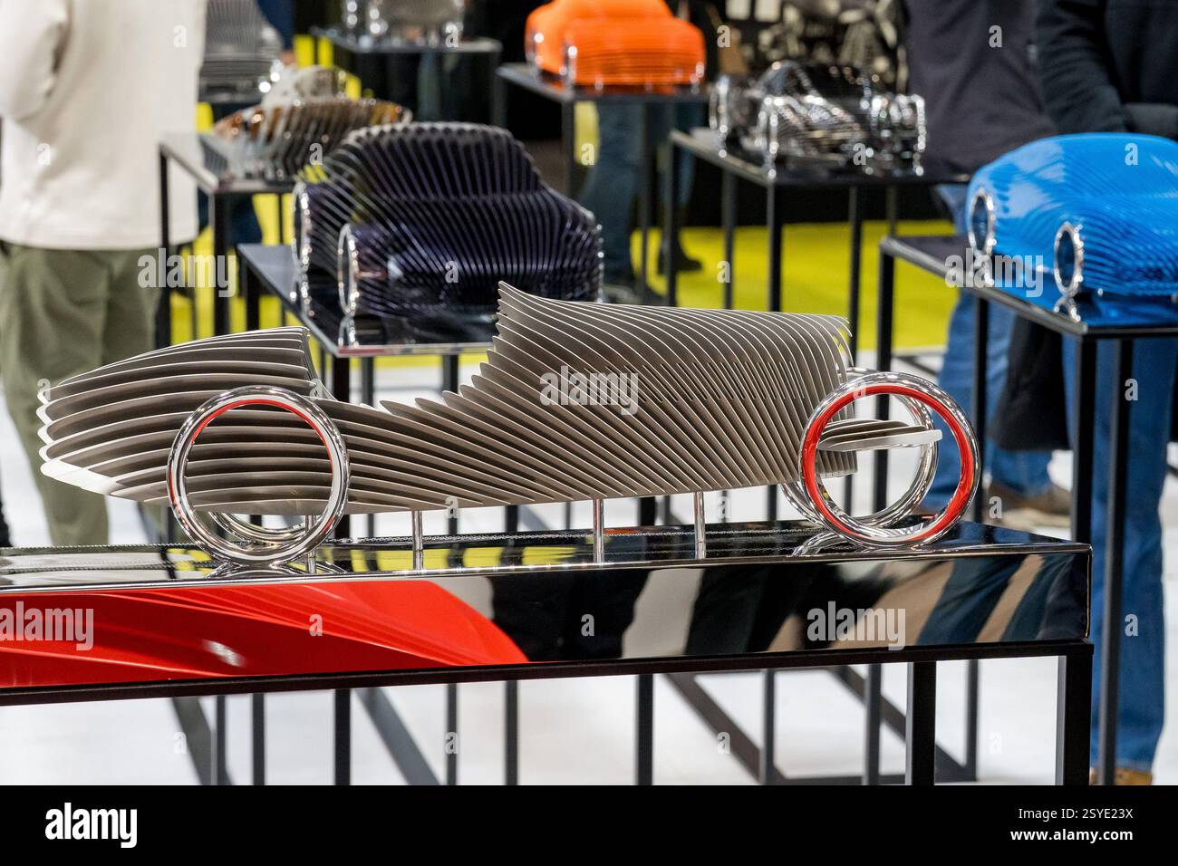 Unique sculptural cars on display at a contemporary design exhibition ...