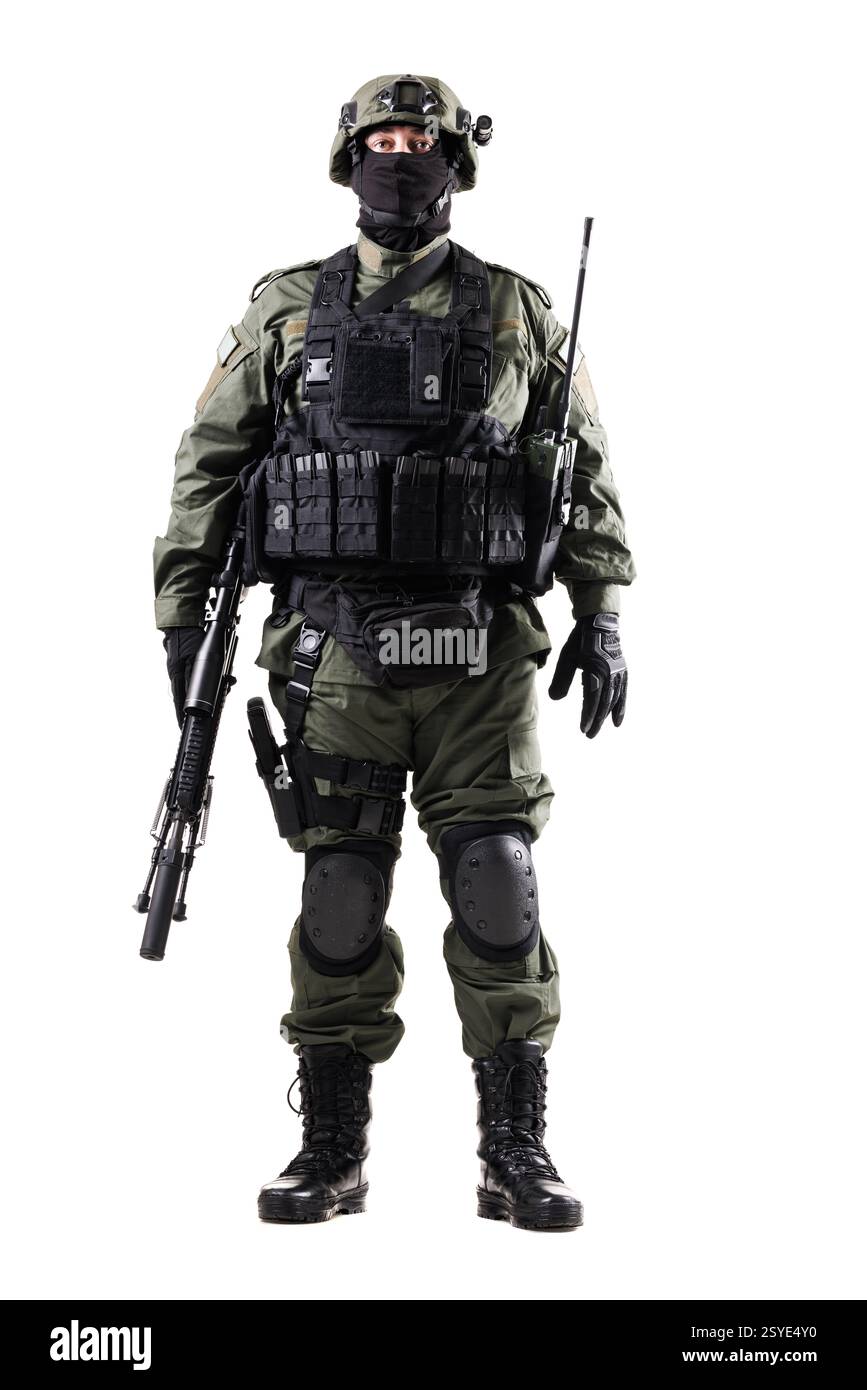 A tactical officer wearing safety equipment, including helmet and body ...