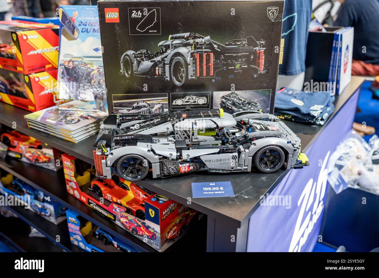 Detail-rich display of a scaled model race car at a vibrant toy expo ...