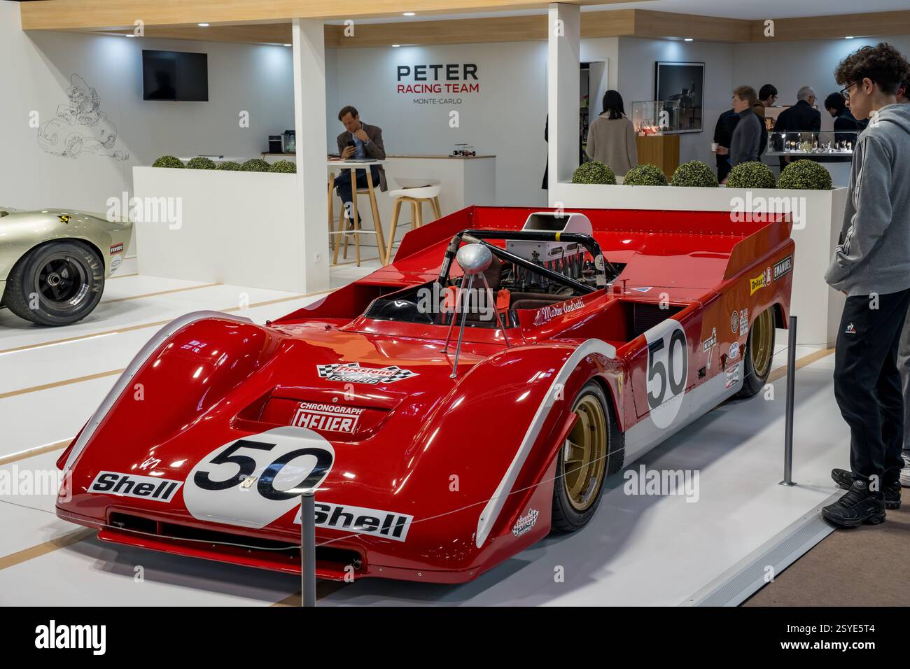 Classic racing car on display at an automotive exhibition highlighting ...