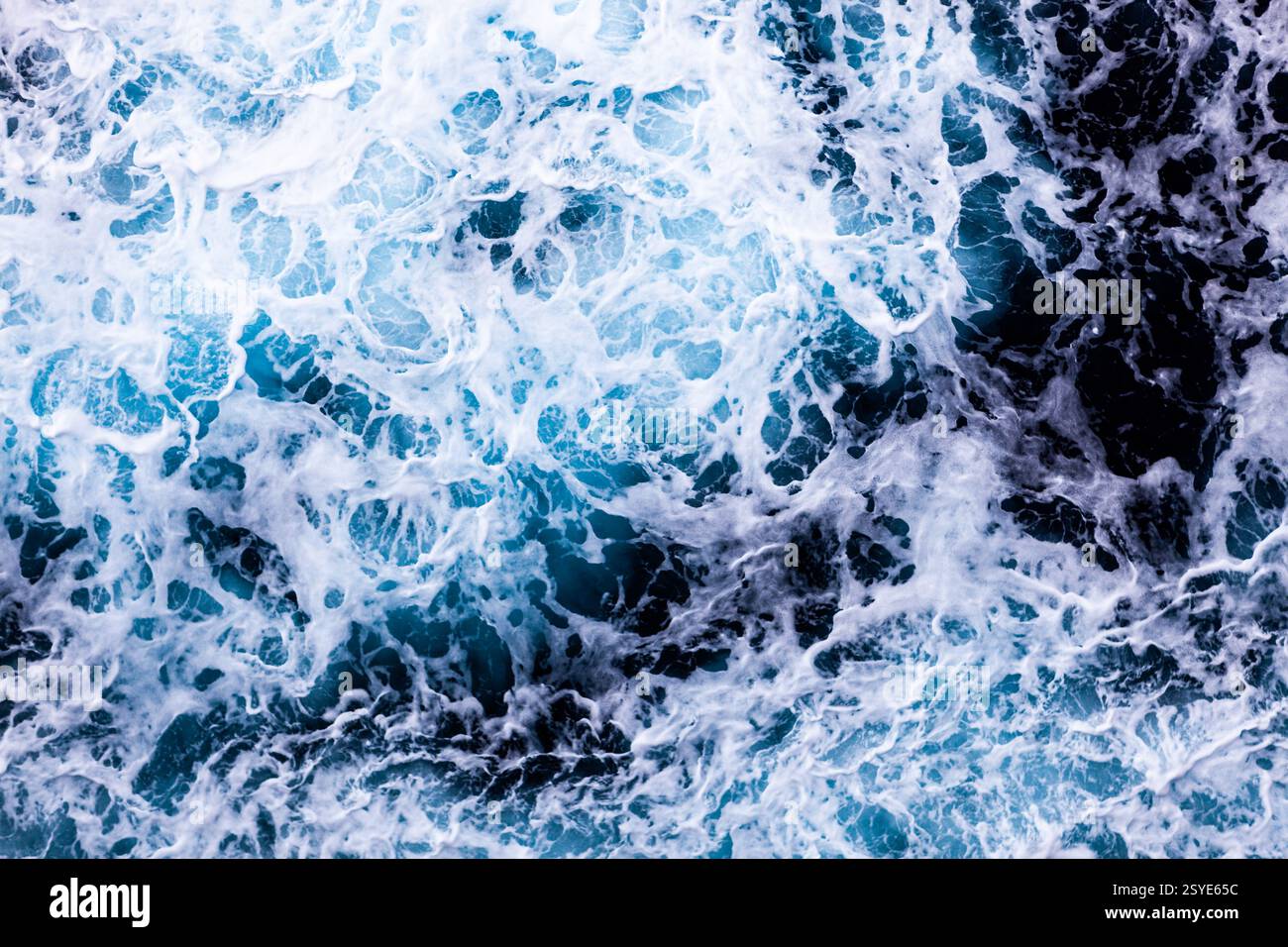 Ocean water surface texture. Aerial view of classy water with foam ...