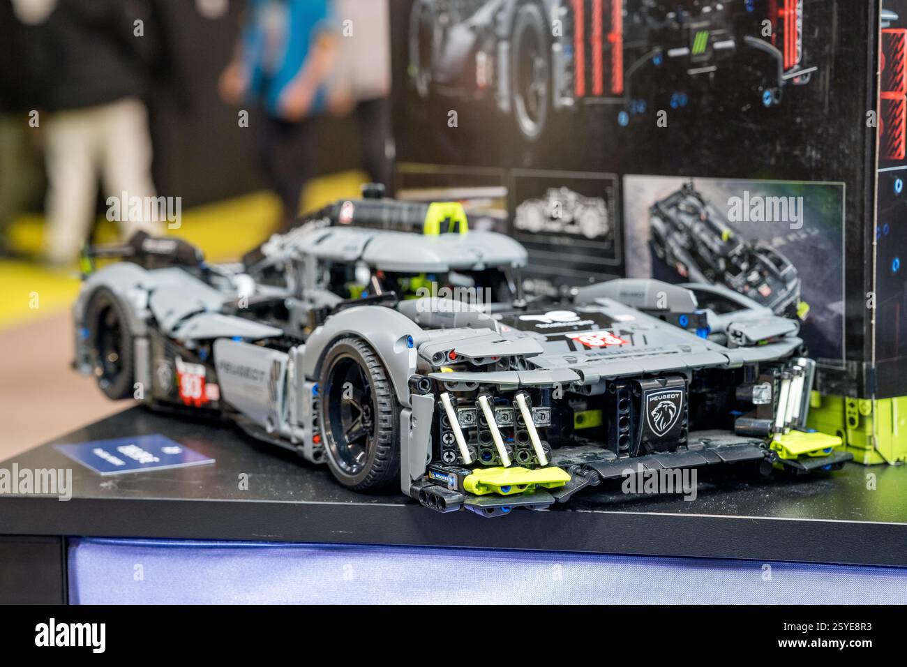 Detailed scale model of a high-performance racing car showcased at a ...