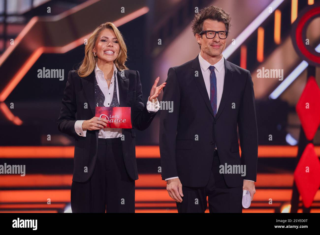 28 February 2025, North Rhine-Westphalia, Cologne: Presenters Daniel ...