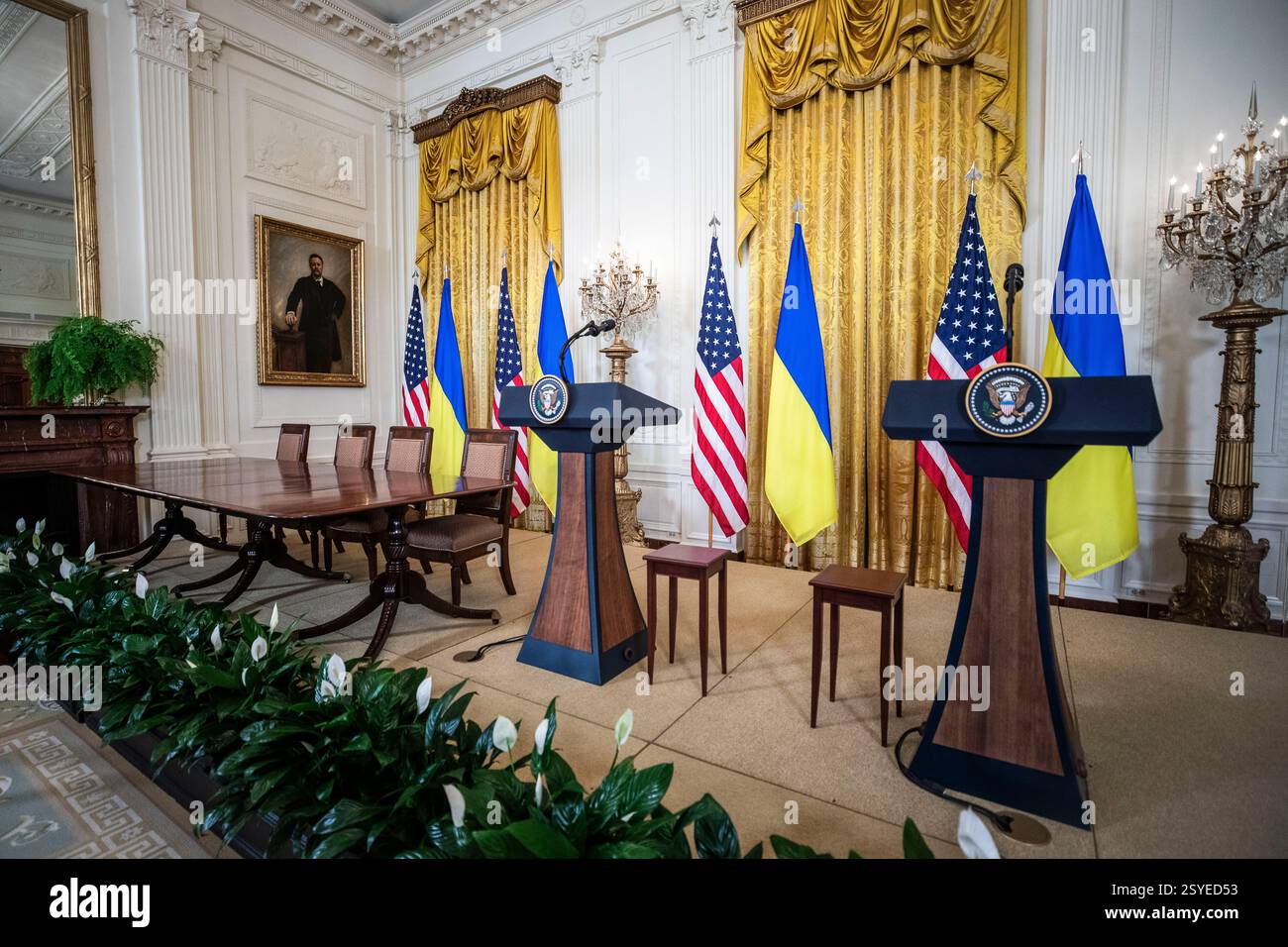 Podiums and a table that were set up for an intended joint press ...