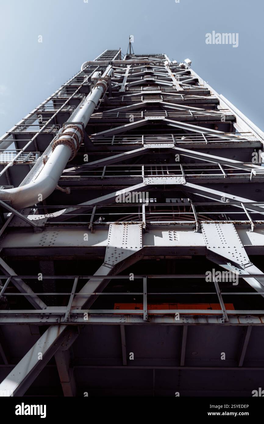 Low-angle view of an industrial metal structure with steel beams ...