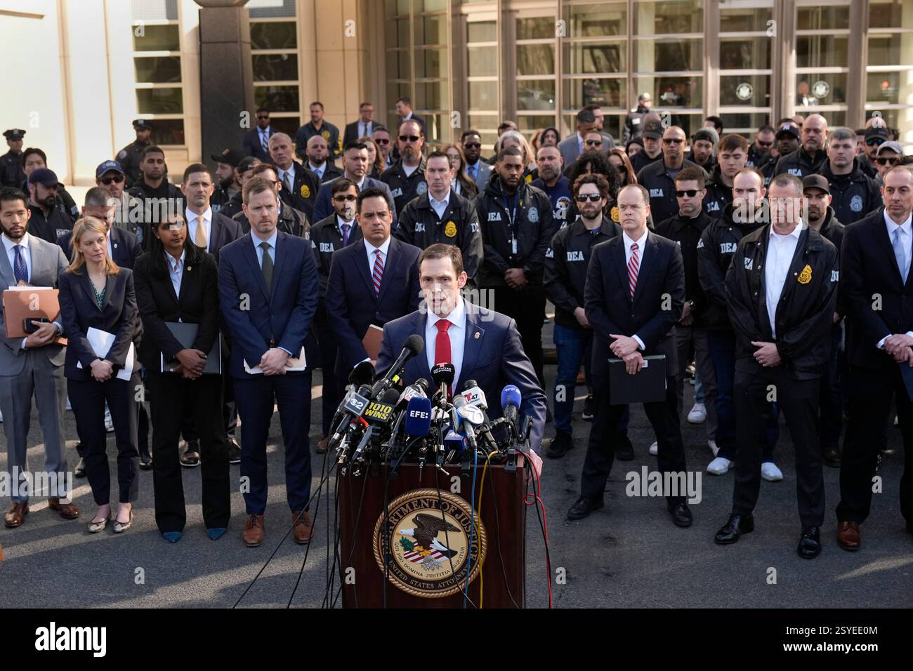 DEA special agent Frank Tarantino II, center front, speaks at a news ...
