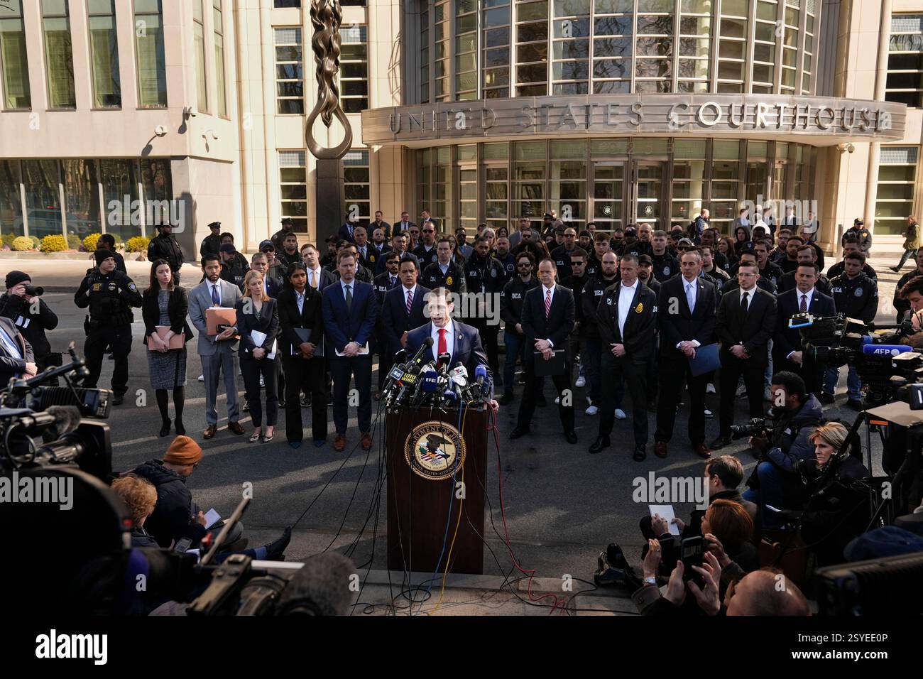 DEA special agent Frank Tarantino II, center front, speaks at a news ...