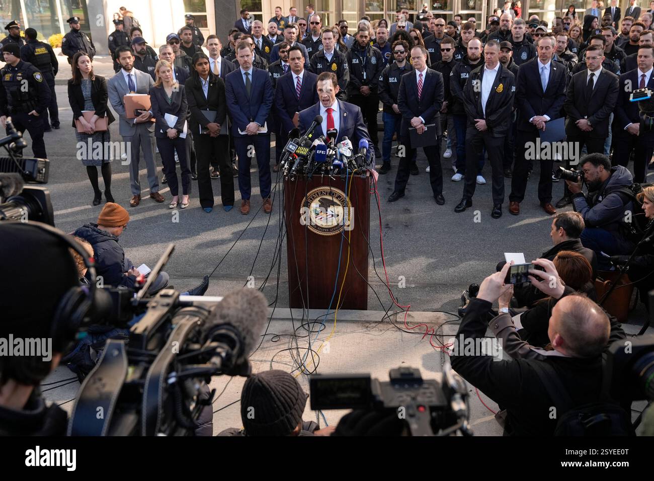 DEA special agent Frank Tarantino II, center front, speaks at a news ...