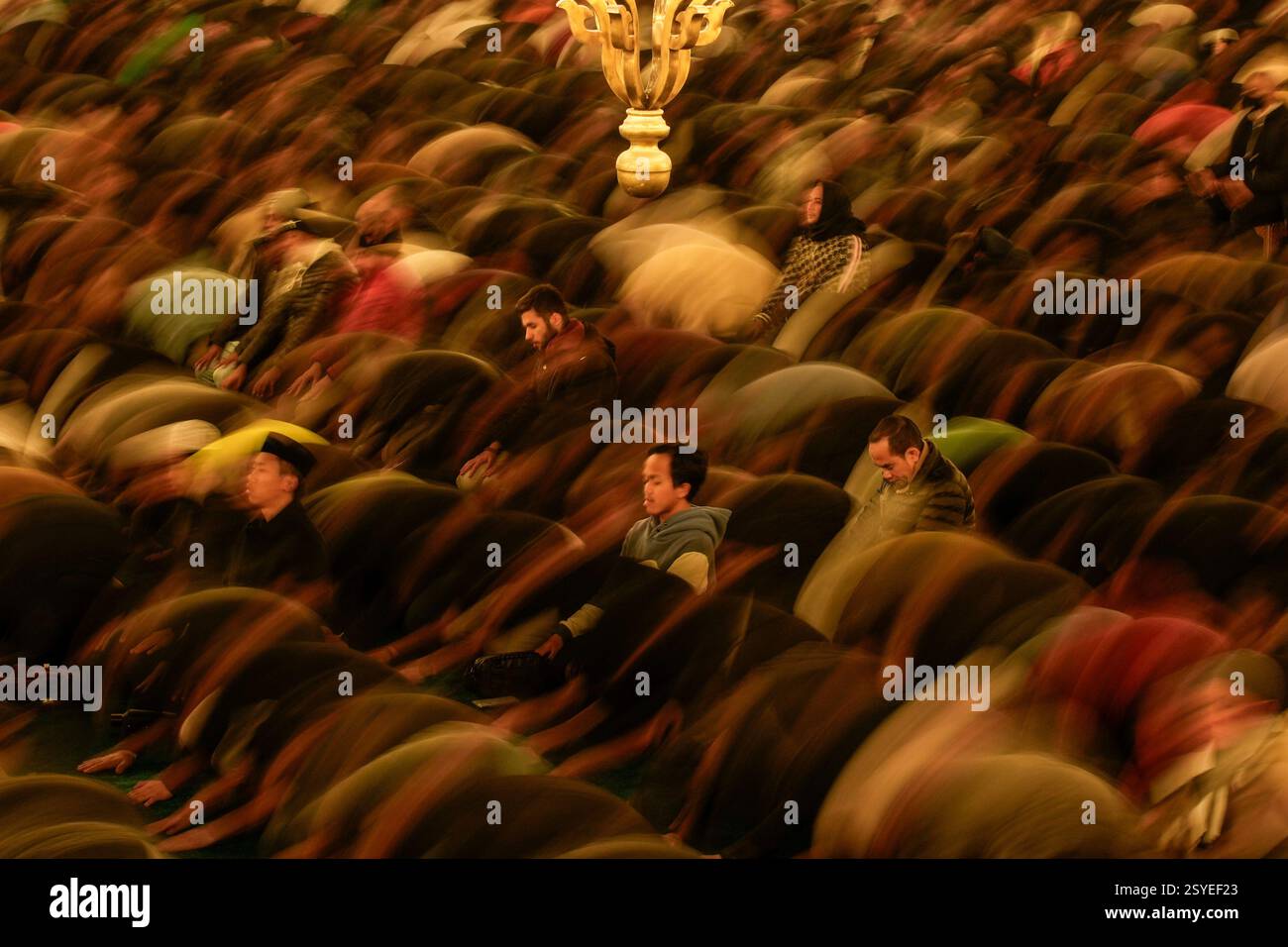Worshippers perform a night prayer called 'Tarawih' during the eve of ...