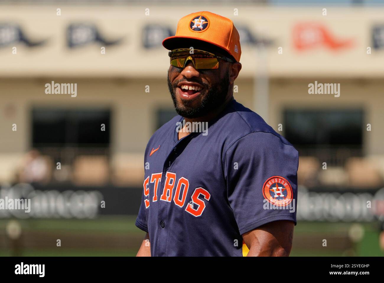 Houston Astros first baseman Jon Singleton smiles during the third inning of a spring training ...