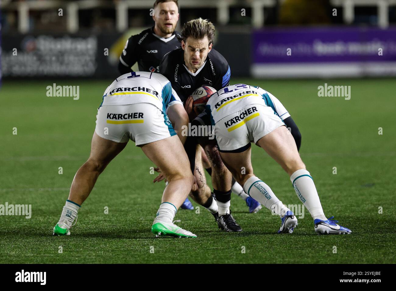 Max Clark of Newcastle Falcons is tackled during the Premiership Cup ...