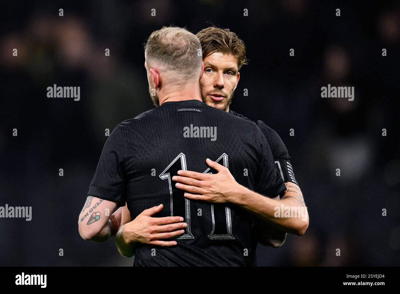 250228 AIKs John Guidetti och Anton Saletros jublar efter 2-0 under fotbollsmatchen i Svenska ...