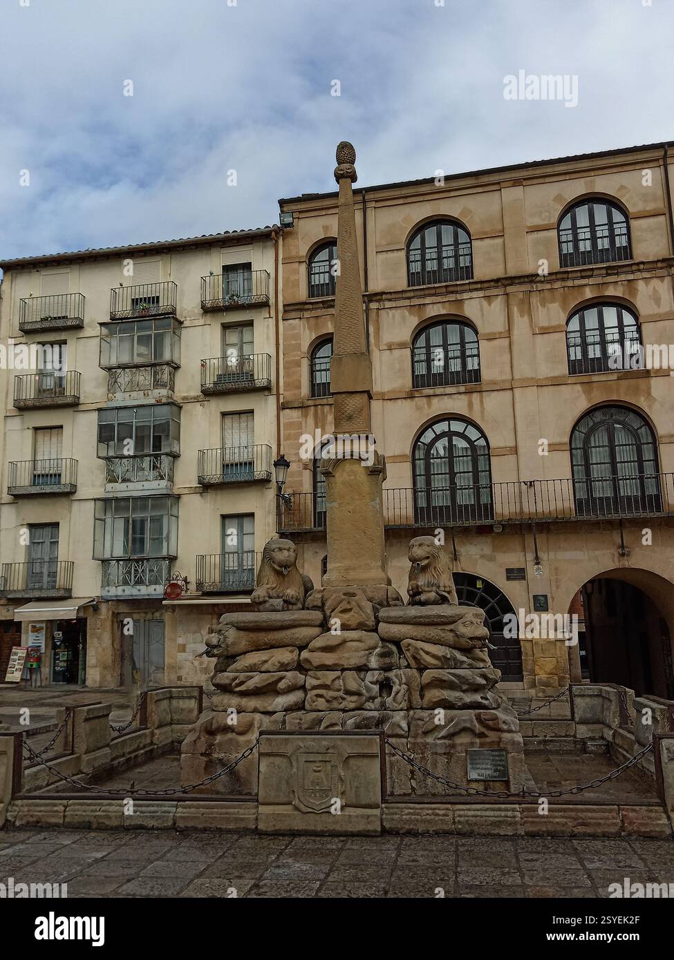 Traditional Spanish square with monuments and historic buildings Stock ...