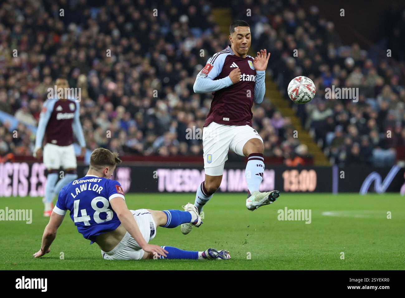 Aston Villa's Youri Tielemans, right, and Cardiff City's Dylan Lawlor ...