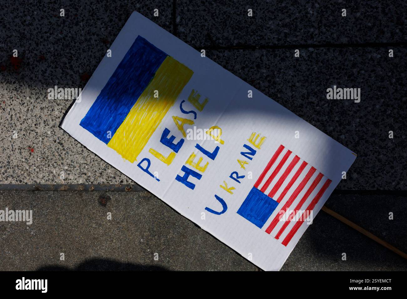 WASHINGTON – Feb. 28, 2025: A sign reading “PLEASE HELP UKRAINE ...