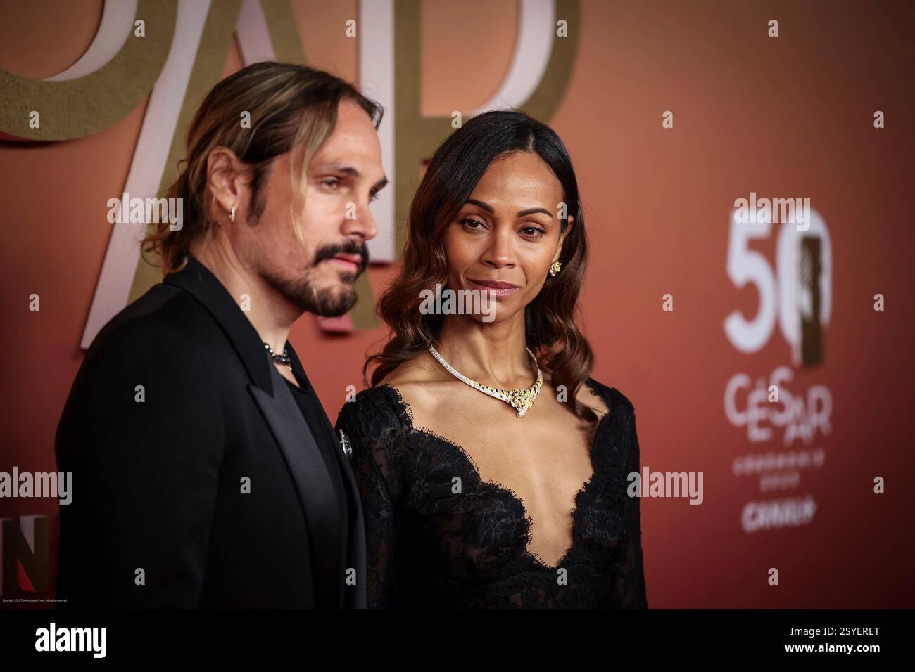 ADDS MARCO PEREGO-SALDAÑA - Zoe Saldana, right, poses for photographers ...