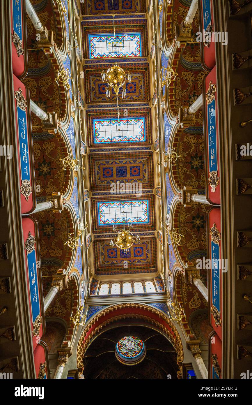 A vertical shot of an ornate interior ceiling featuring a series of ...