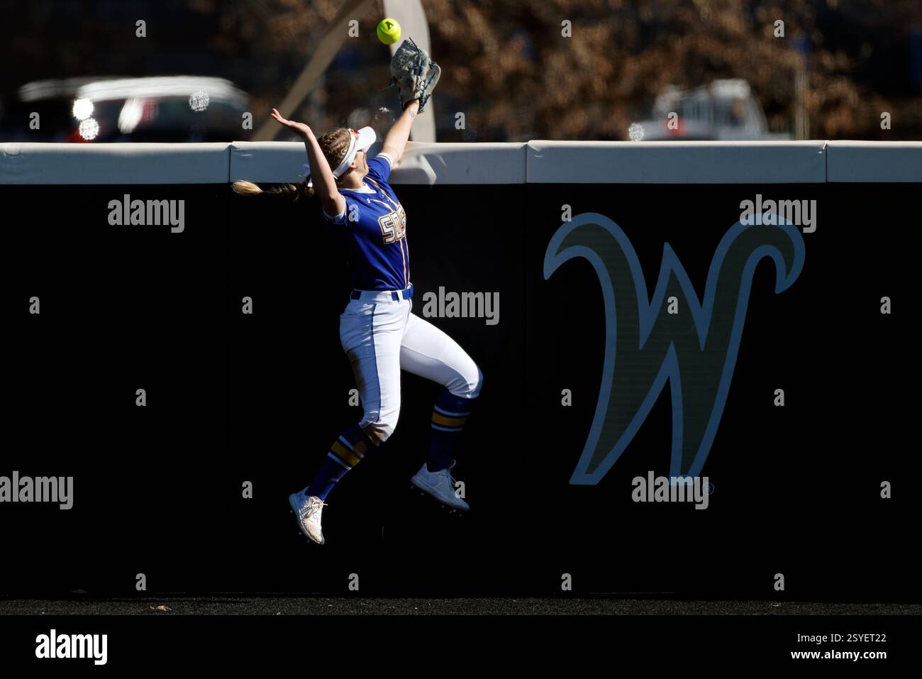South Dakota State center fielder Akayla Barnard is unable to catch a ...