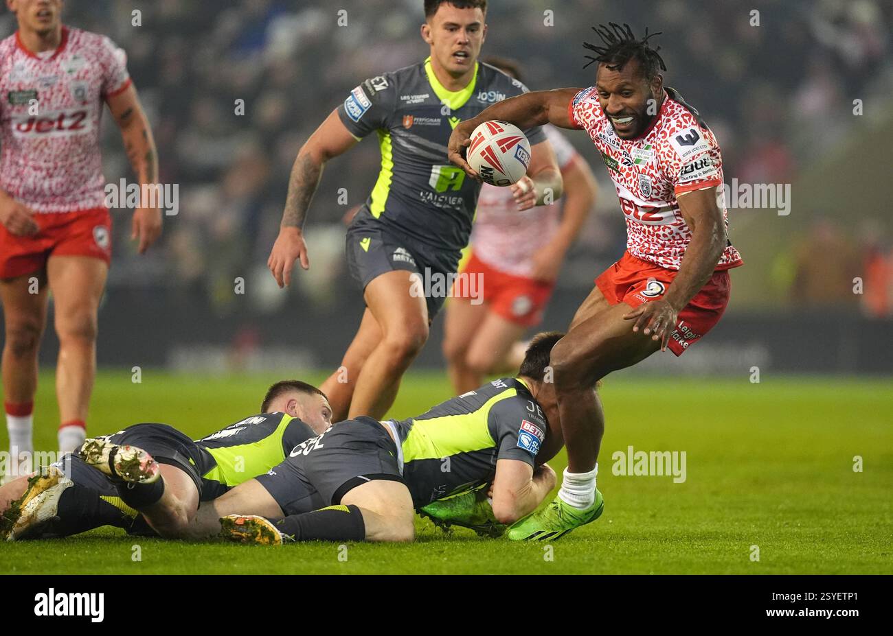 Leigh Leopards' Edwin Ipape is tackled by Catalans Dragons' Luke Keary, during the Betfred Super ...
