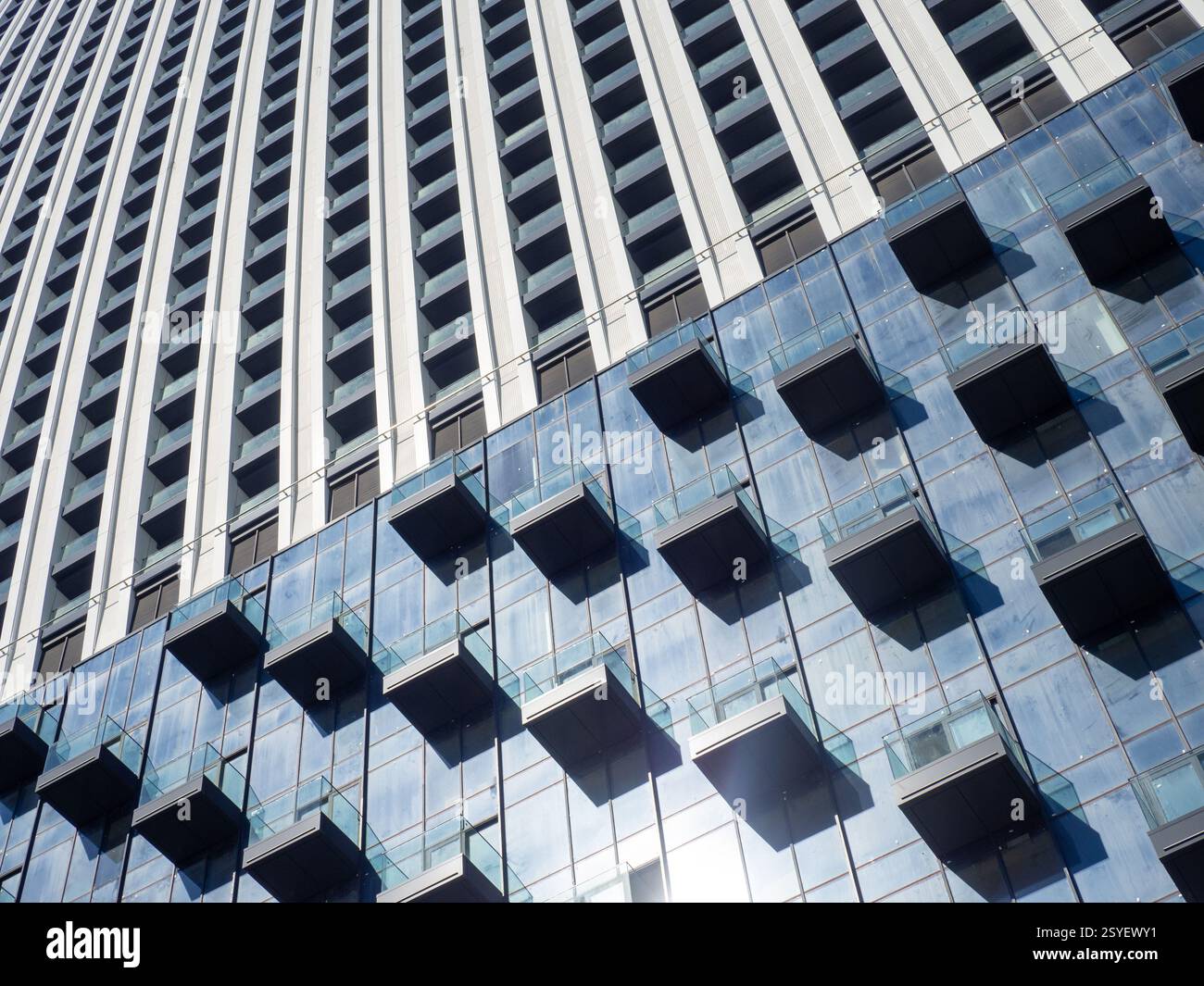 Facade of a modern multi-storey building. Balconies of a high-rise ...