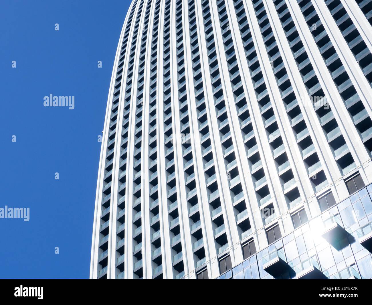 Facade of a modern multi-storey building. Balconies of a high-rise ...