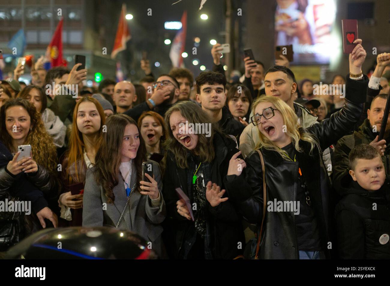 People cheer as university students and other protesters arrive to the ...
