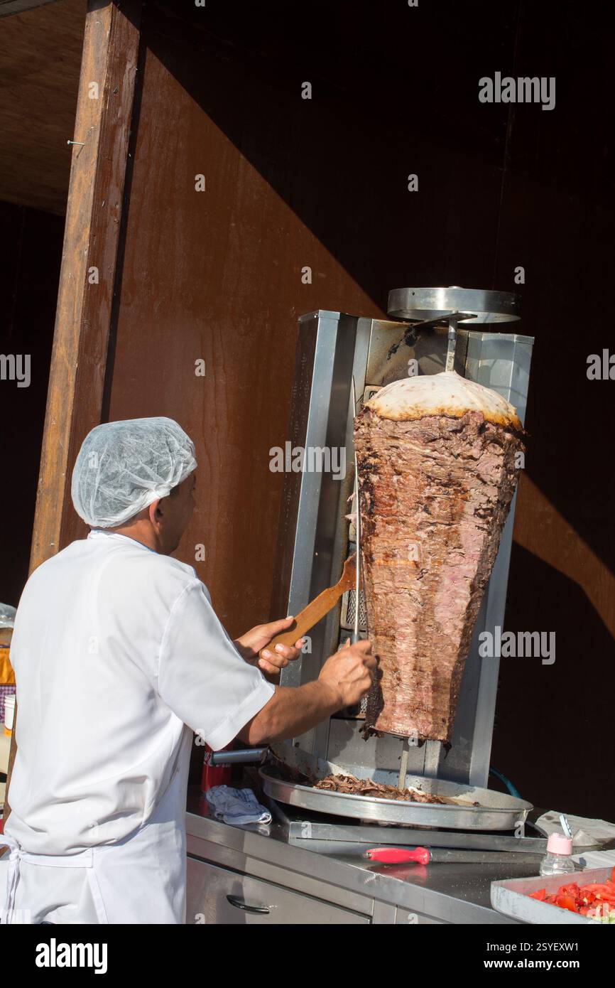 Traditional Turkish Doner Kebab on pole Stock Photo - Alamy