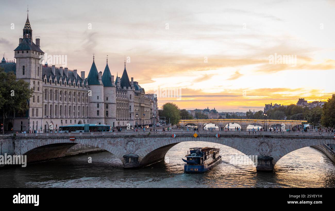 Lovely evening scene at the bridges over seine river in paris, with sun ...