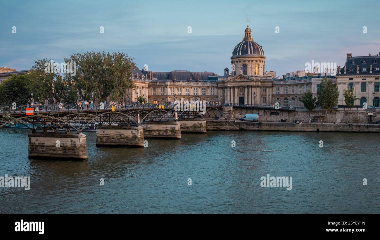 Lovely evening scene at the bridges over seine river in paris, with sun ...
