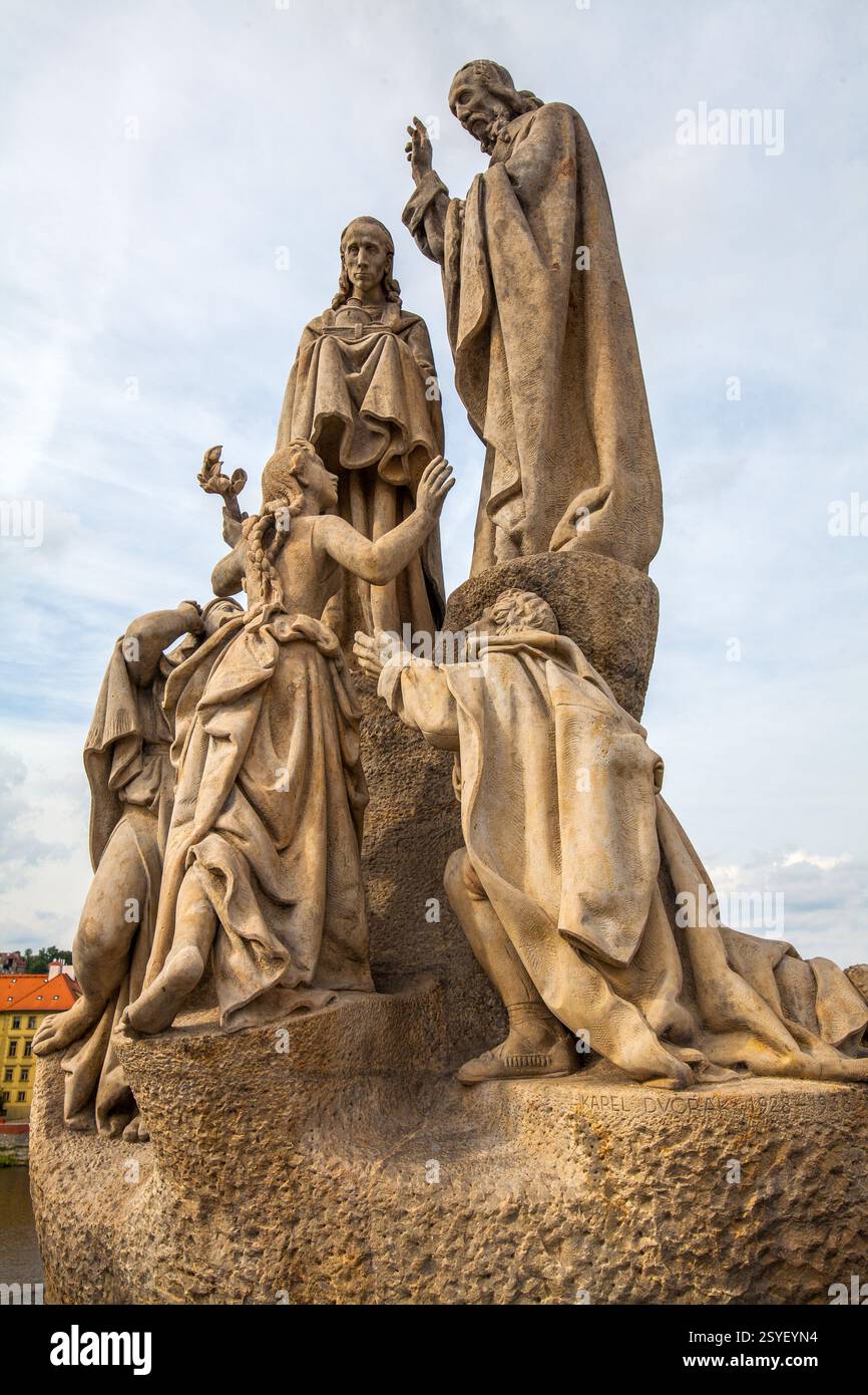 A statue group featuring several figures with detailed clothing ...