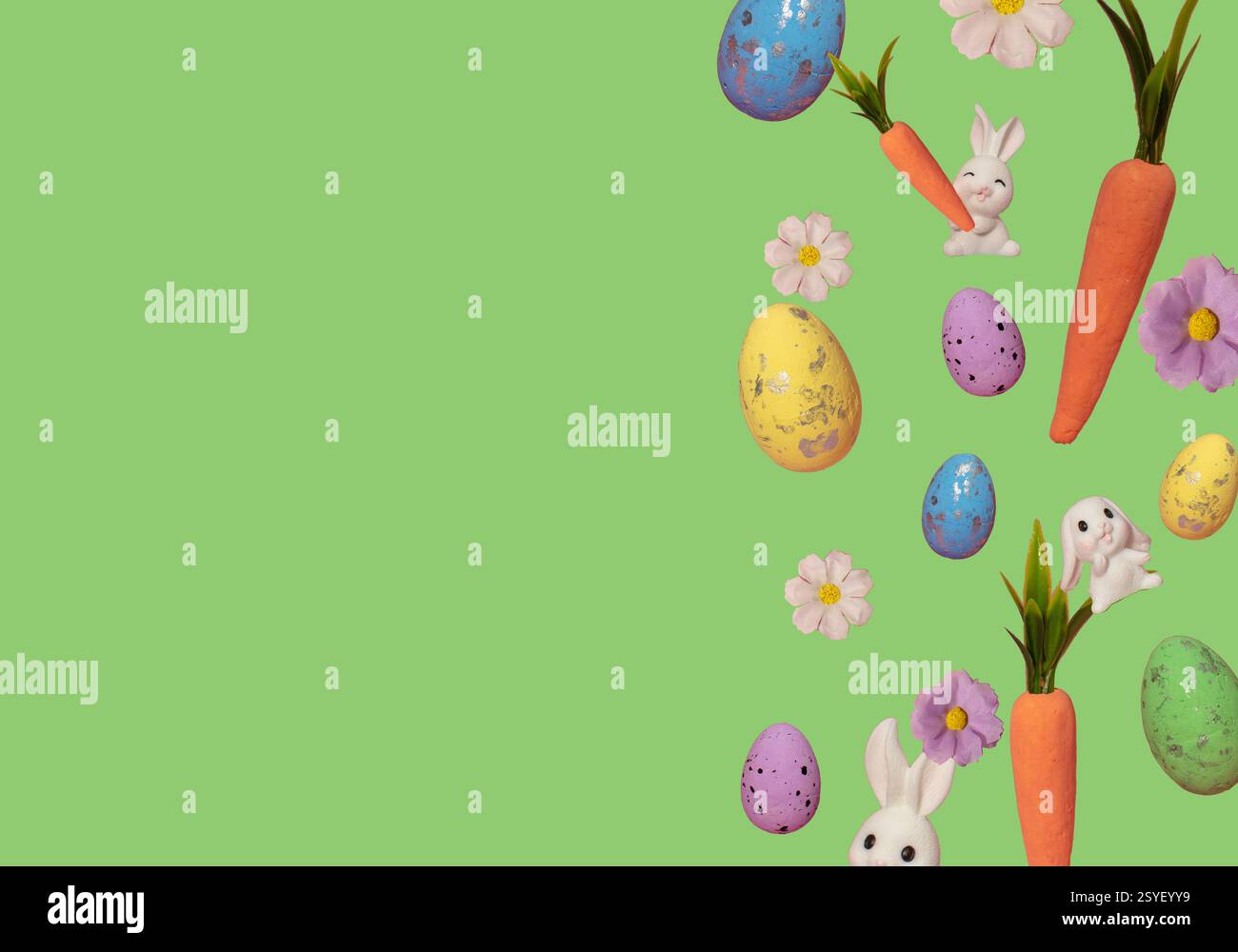 Easter layout made with carrots, eggs, flowers and bunnies on pastel ...