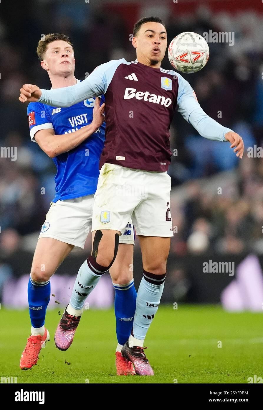 Aston Villa's Morgan Rogers (right) and Cardiff City's William Fish ...