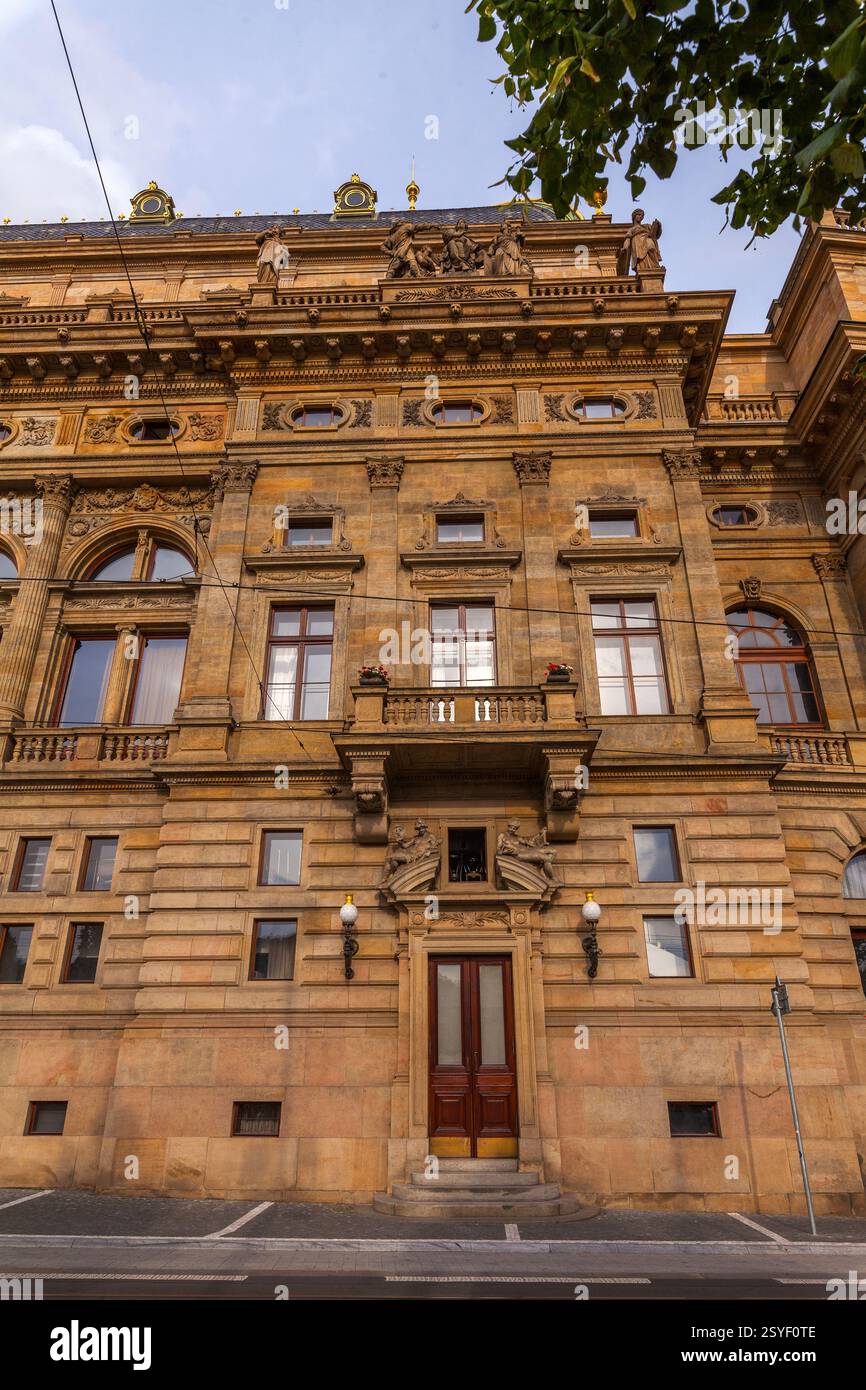 A grand historic building with an ornate facade, featuring detailed ...