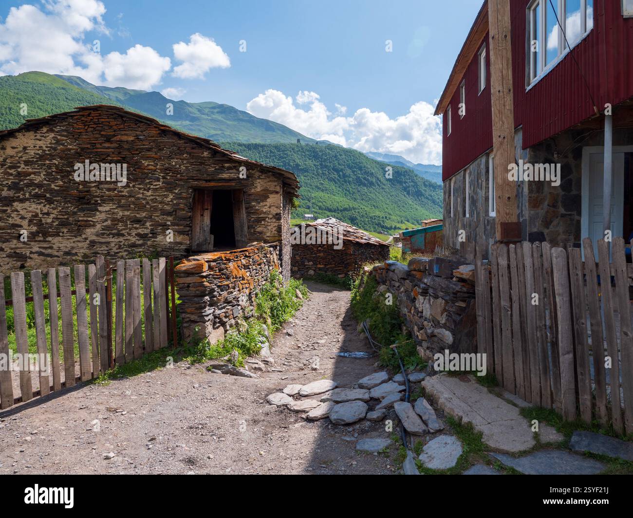 Rustic mountain village in Mestia, Georgia, featuring old stone houses ...