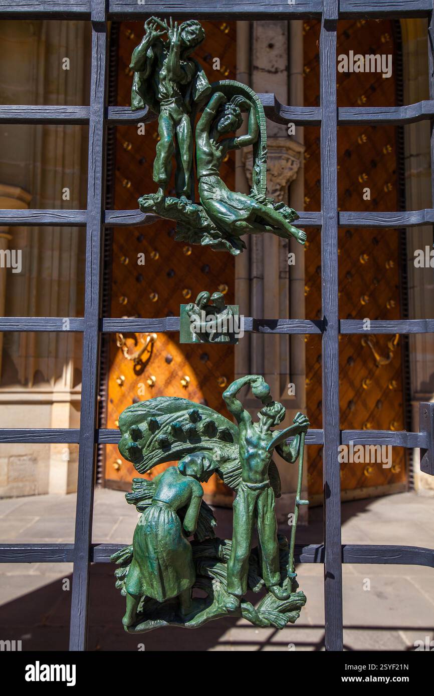 A close-up shot of an ornate metal gate with sculpted figures in ...