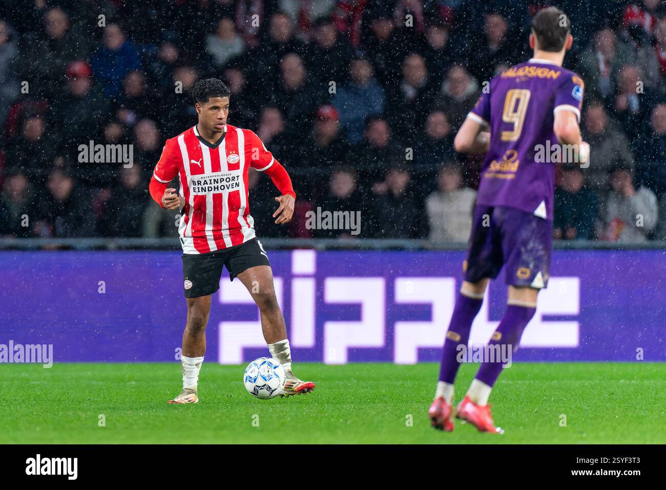 EINDHOVEN, NETHERLANDS - FEBRUARY 26: Ryan Flamingo of PSV and Milan Smit of Go Ahead Eagles ...
