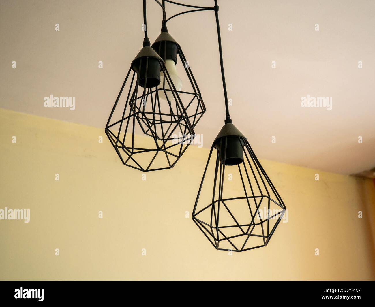 Three platforms chandelier. Lighting fixture. There are not enough ...